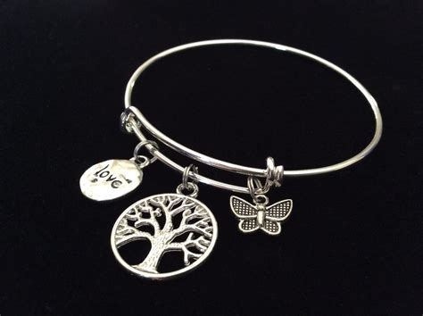 Tree Of Life Butterfly And Love Charm On A Silver Expandable Wire Ban