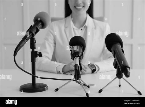 Journalist Conference Businesswoman Giving Interview At Table With