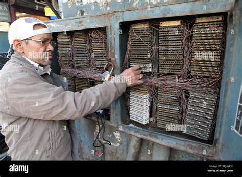 An Electrician Tests A Fuse Box In Delhi India Stock Photo Alamy