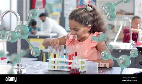 Conducting Science Experiment Girl In Classroom With Molecule Image Over Scene Education