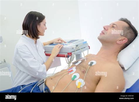 Performing An Electrocardiography Stock Photo Alamy