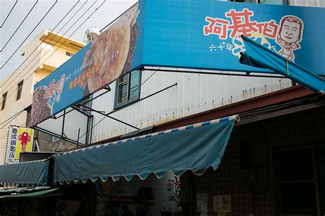 屏東美食萬丹美食一條街吃透透旗魚黑輪萬丹市場紅豆餅阿基伯燒冷冰 用快門記錄著生活