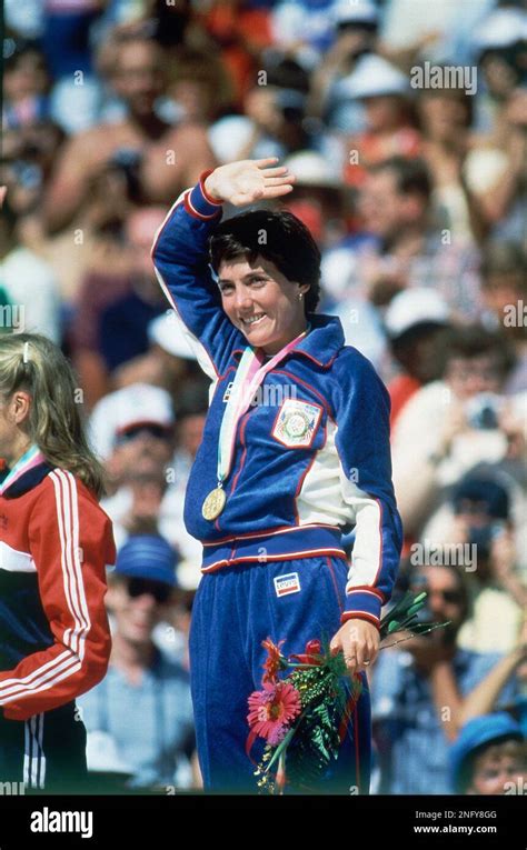 Joan Benoit Gold Medalist Shown Waving To The Fans After Winning The Womens Marathon In The