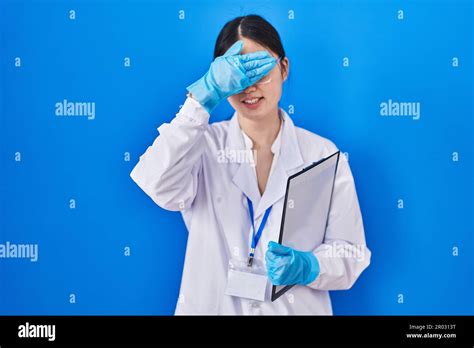 Chinese Young Woman Working At Scientist Laboratory Smiling And