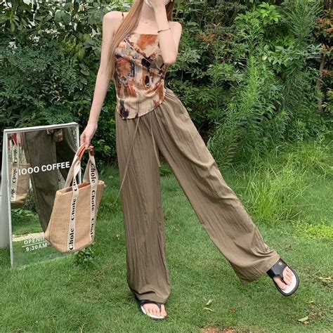 코디세트스퀘어넥 캐주얼 패턴 슬림 슬리브리스주름 디테일 와이드 팬츠 세트 2k110498e