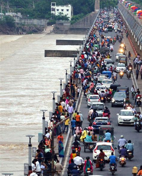 Flood Warning Issued At Prakasam Barrage Photos Sakshi
