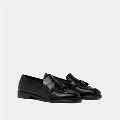 Mocassins à Talons Plats Et Pompons En Cuir Noir Jonak