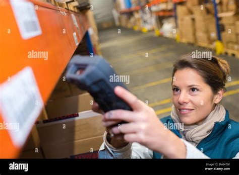Female Worker Scanning Bar Code Of Packages Stock Photo Alamy Female Worker Scanning Bar Code Of Packages Stock Photo Alamy