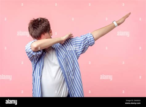 Portrait Of Anonymous Brown Haired Man In Casual Striped Shirt With