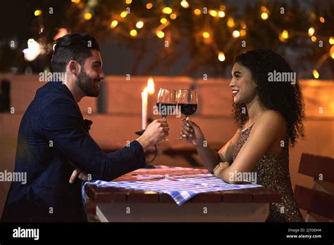 Heres To Our Future Together My Love A Cheerful Young Couple Having A