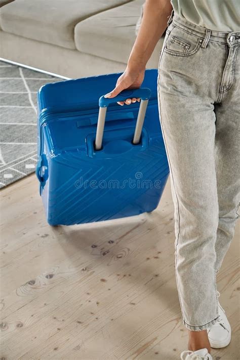 An Impersonal Woman With A Suitcase Is Forced To Leave Her Home Forced