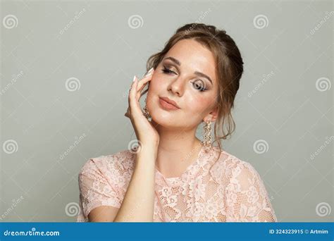 Healthy Good Looking Woman With Updo Hairstyle And Makeup Young Female