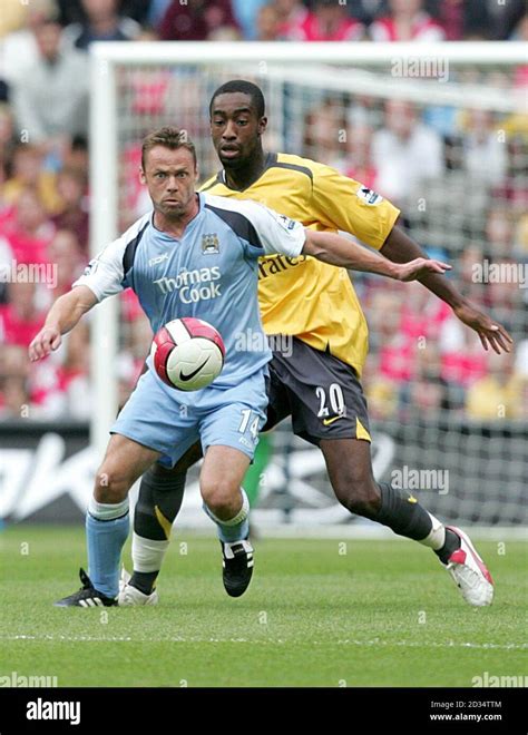 Arsenals Johan Djourou Marking Manchester Citys Paul Dickov Stock