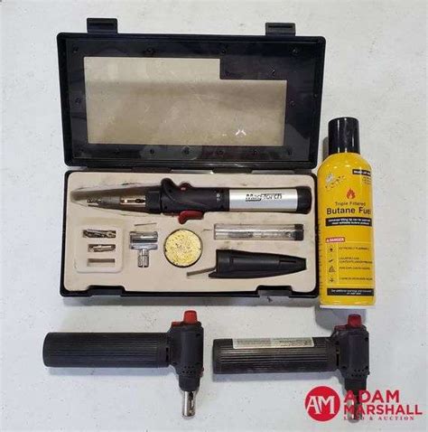 assorted mag torches accessories and butane partial can adam