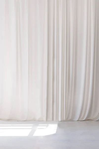 White Curtain That Dropped Down As A Straight Line White Wooden Floor