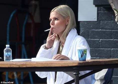 Sophie Monk Takes A Smoke Break In Ugg Boots And A Dressing Gown