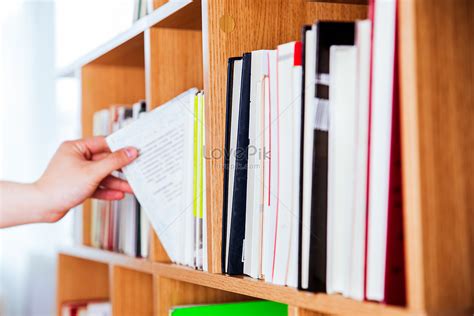 Library Holding Book Close Up Picture And Hd Photos Free Download On Lovepik