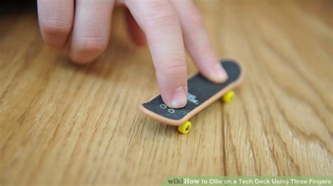 How To Ollie On A Tech Deck Using Three Fingers Steps