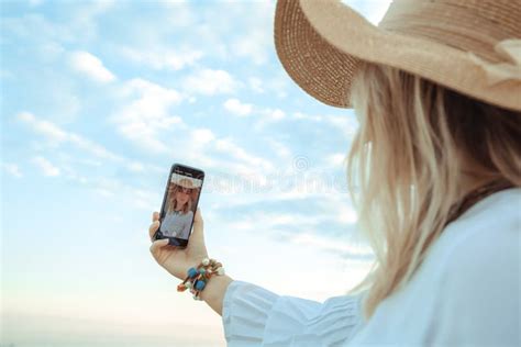 Person Takes A Selfie On The Smartphone Young Beautiful 30 Years Woman