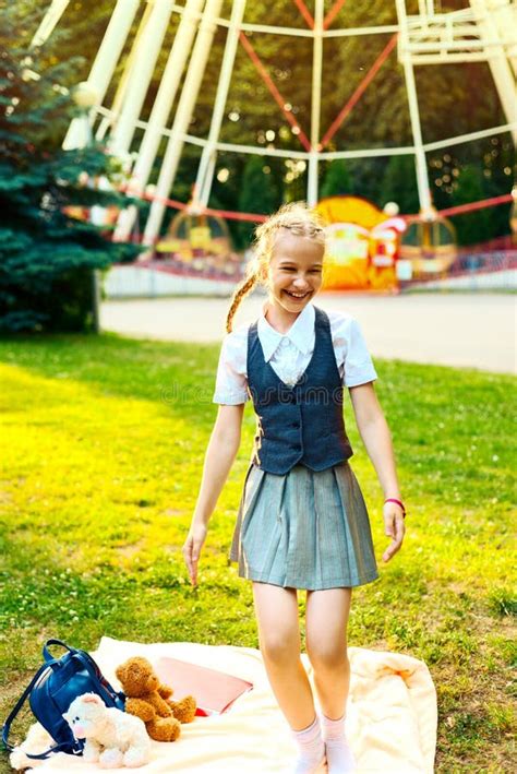 Schoolgirl Joyfully Dances In The Park Stock Image Image Of Gesture