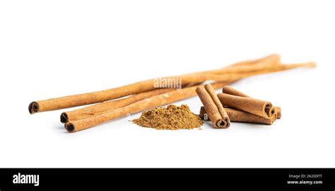 Dry Cinnamon Sticks And Cinnamon Powder Isolated On White Background