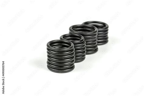 Hydraulic And Pneumatic O Rings In Black In Different Sizes On A White
