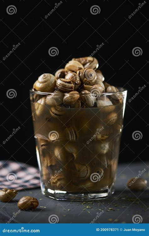 Caracolillos En Caldo Spanish Recipe Of Snails Stock Image Image Of