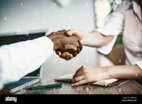 Female Business Handshake In Agreement Stock Photo Alamy