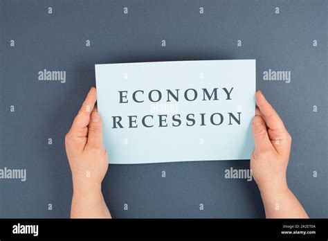 The Words Economy Recession Are Standing On A Paper Inflation And