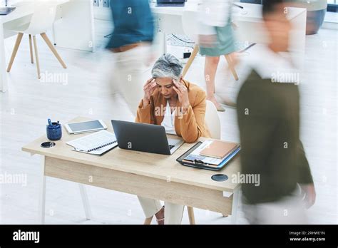 Busy Office Stress And Senior Woman With Headache Crisis Or Vertigo