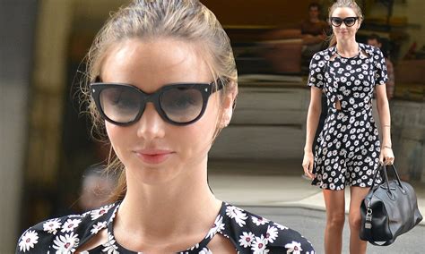 Miranda Kerr Displays Her Slender Legs In A Flirty Floral Sundress