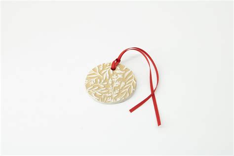 Dana And Tess Ornament Round Gold Ornament Indigenous Pei