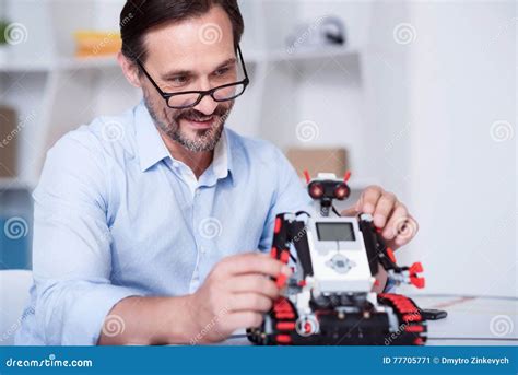 Smart Scientist Working On A Robot Production Stock Image Image Of Constructor Model 77705771