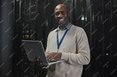 Premium Photo Server Laptop And Portrait Of Black Man Or Technician