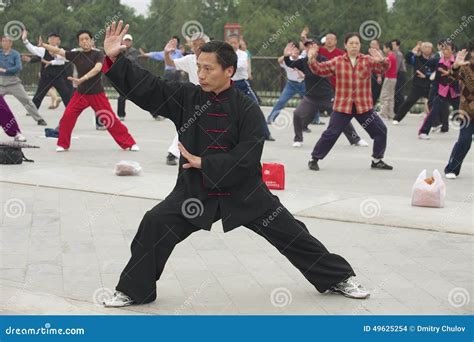 People Practice Tai Chi Chuan Gymnastics In Beijing China Editorial
