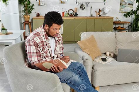 Young Man Writing In A Notebook Stock Image Image Of Thoughtful Working 351419923