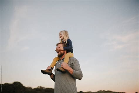 Dad And Daughter Outside Together By Stocksy Contributor Rob And