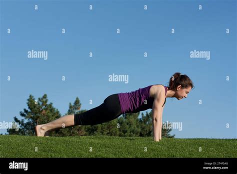 Fit Young Athletic Woman Doing Static Plank Exercise Training