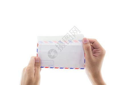 手上的黄色信封在白色背景上被孤立问候语文档邮件邀请函办公室笔记卡片高清图片下载 正版图片321521917 摄图网