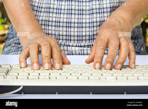 Elderly Woman Hands On Computer Keyboard Stock Photo Alamy