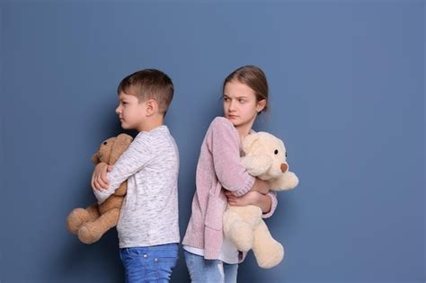 Premium Photo Brother Arguing With Sister On Color Background