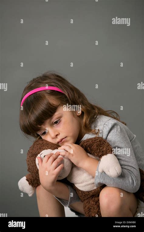 Portrait Of Young Girl With A Bruise Or Black Eye On Her Left Side