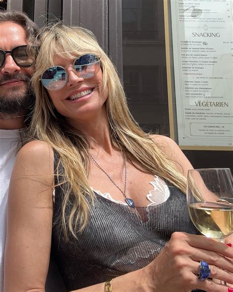 Agt Judge Heidi Klum Flashes Her White Lacy Bra In See Through Top For