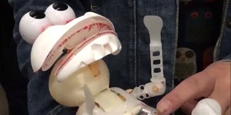 A Nightmarish Tickle Me Elmo With Its Fur Removed