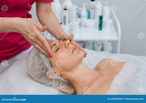 Face Massage Young Woman Getting Spa Massage Treatment At Beauty Spa