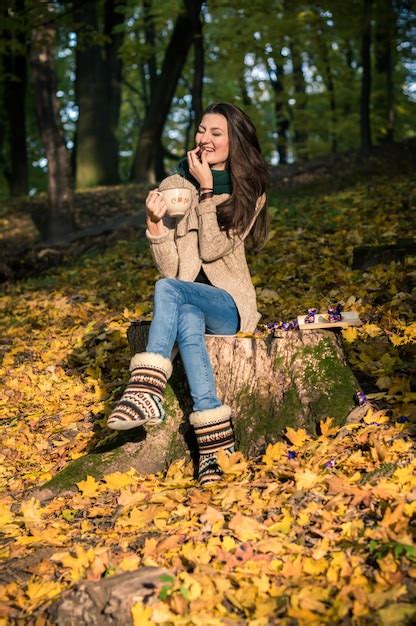 Premium Photo Girl Sitting On Tree Stump