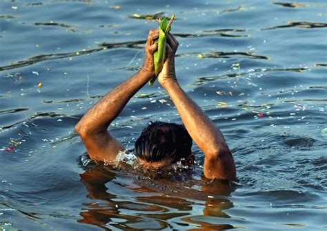 A Devotee Offering Baliâ Ancestral Rites At Aluva Manappuram