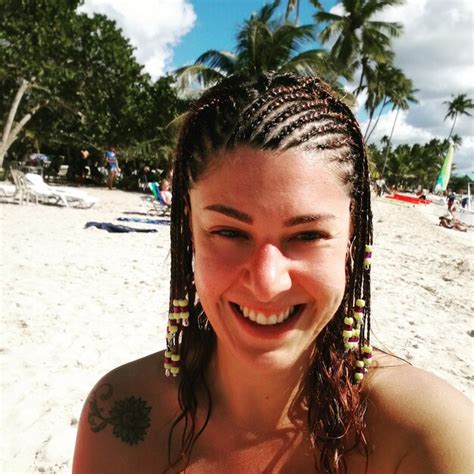 Premium Photo Portrait Of Smiling Young Woman At Beach