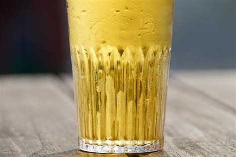 Premium Photo Close Up Of Drinking Glass On Table