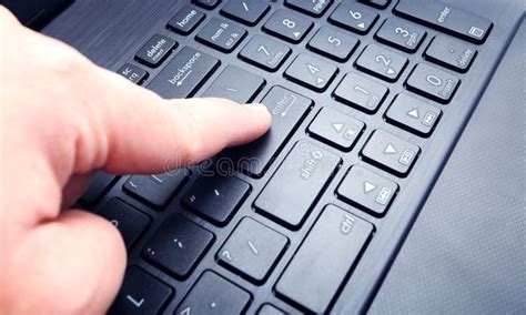 finger pressing return key on keyboard stock image image of